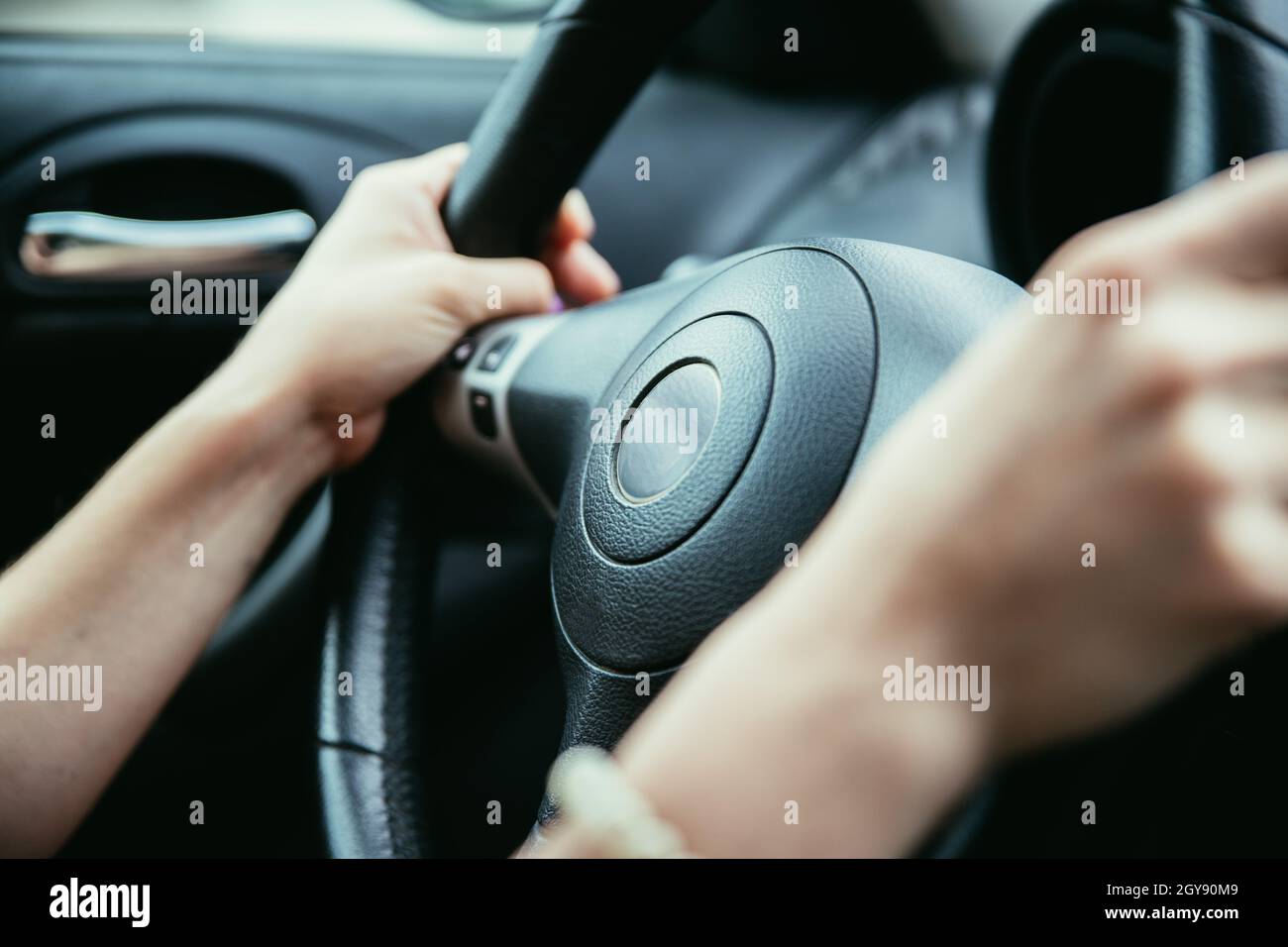 Female hands on wheel motor hi-res stock photography and images - Alamy