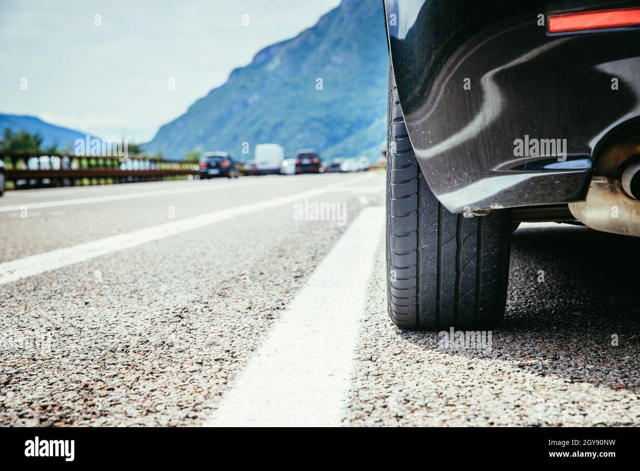 Close up of a car standing on a breakdown lane, summer vacation Stock ...