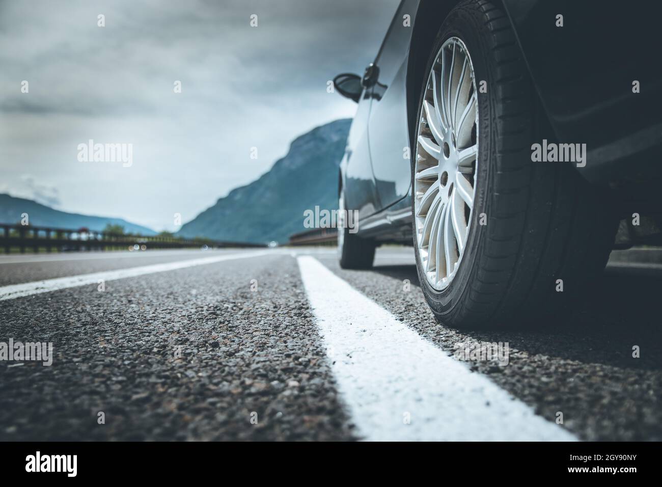 Close up of a car standing on a breakdown lane, summer vacation Stock ...