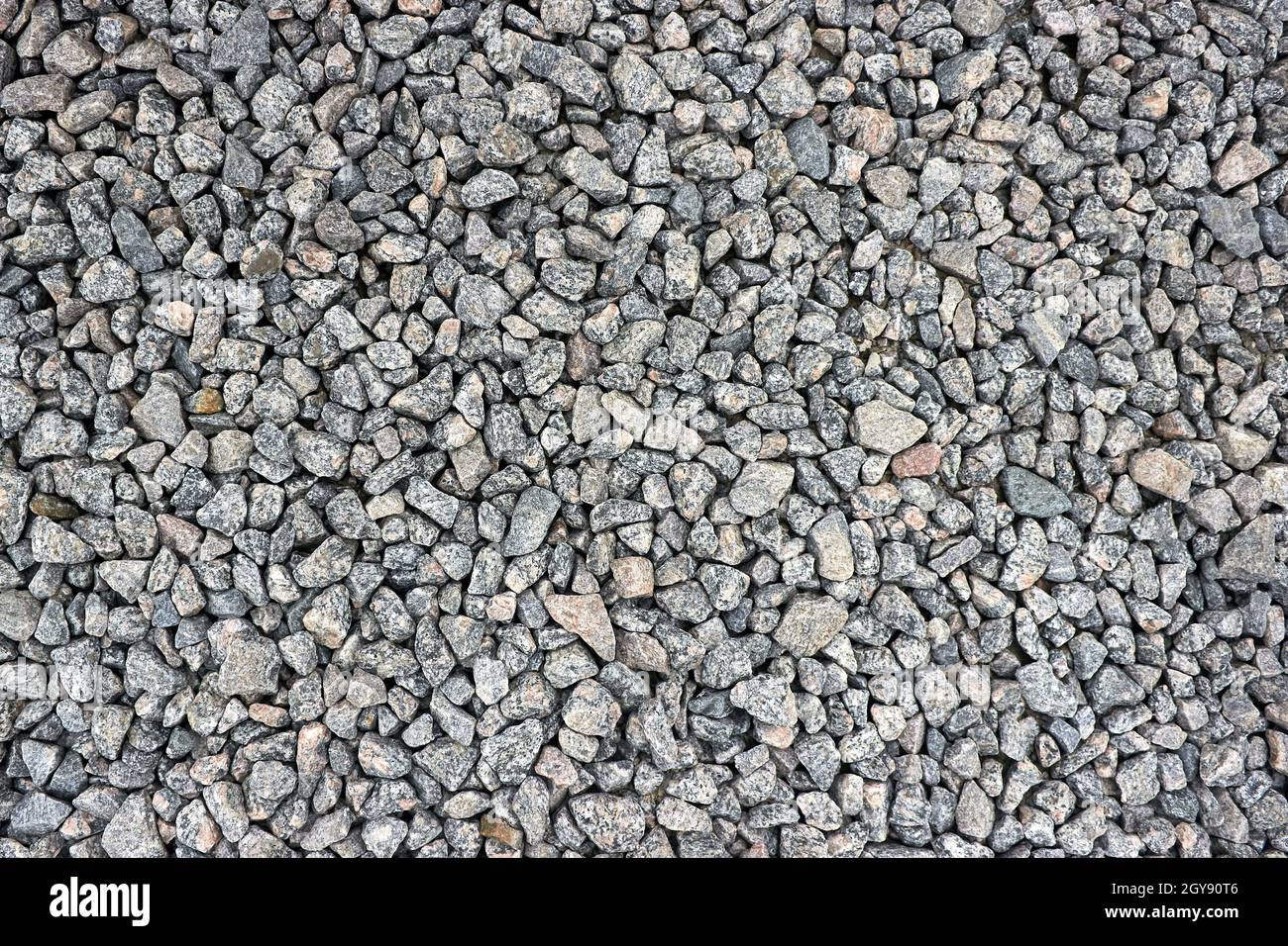 Pebbles concrete stone background hi-res stock photography and images ...