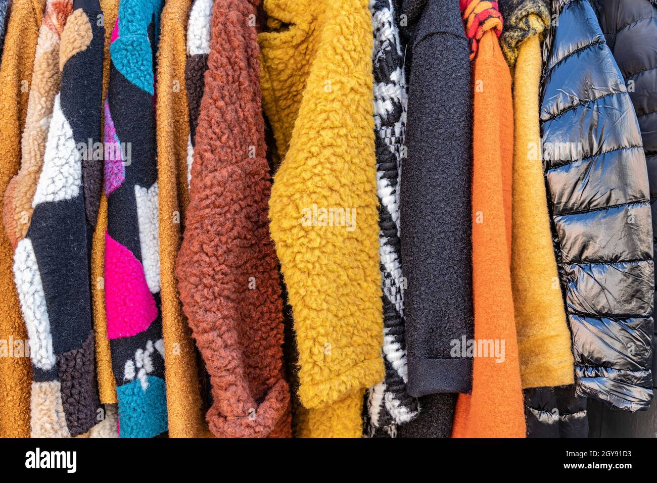 Coats hanging hi-res stock photography and images - Alamy