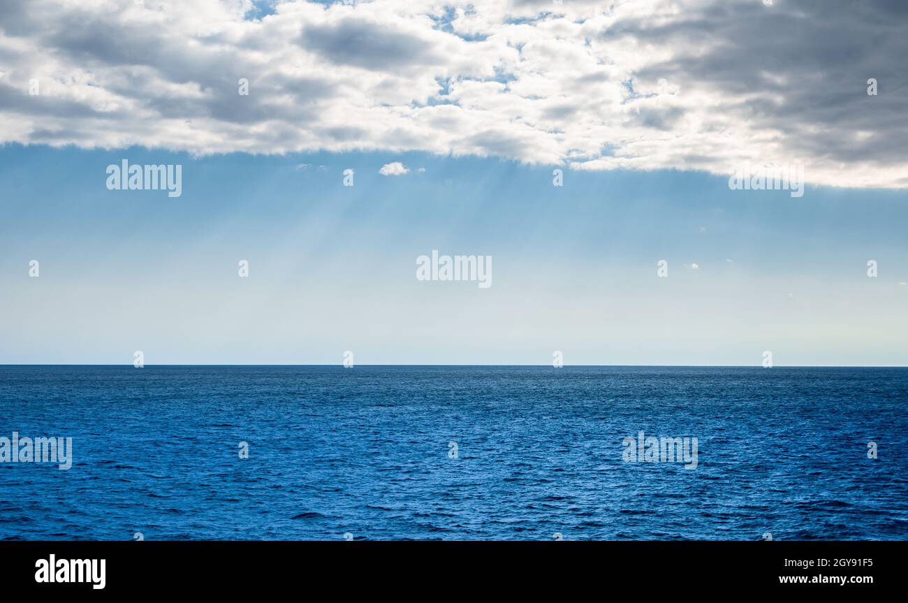 Blue seascape clear sky calm hi-res stock photography and images - Alamy