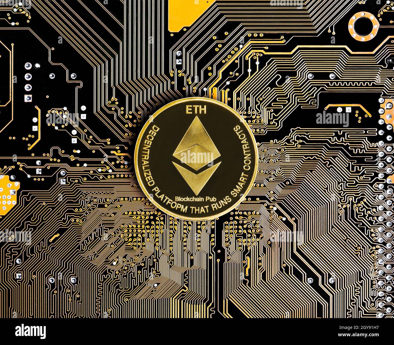 Close up ethereum coin on black circuit mainboard of computer ...