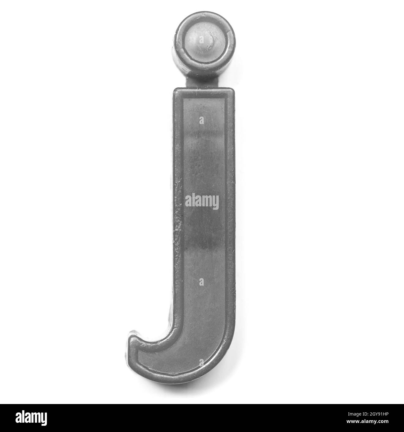 Magnetic lowercase letter J of the British alphabet in black and white ...