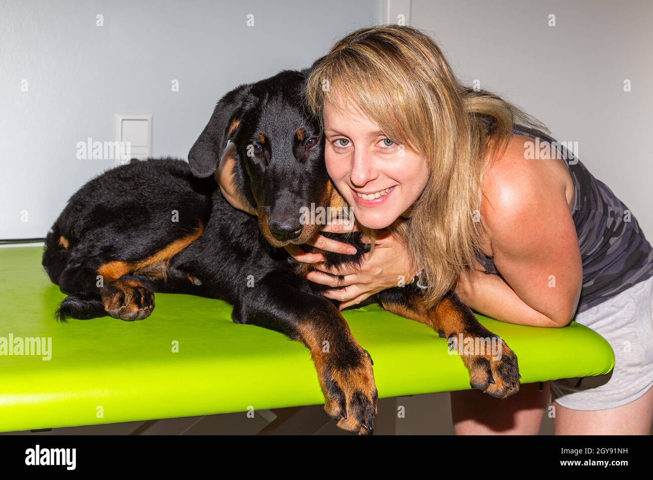 therapist gives a big hug to her patient in physical therapy Stock ...