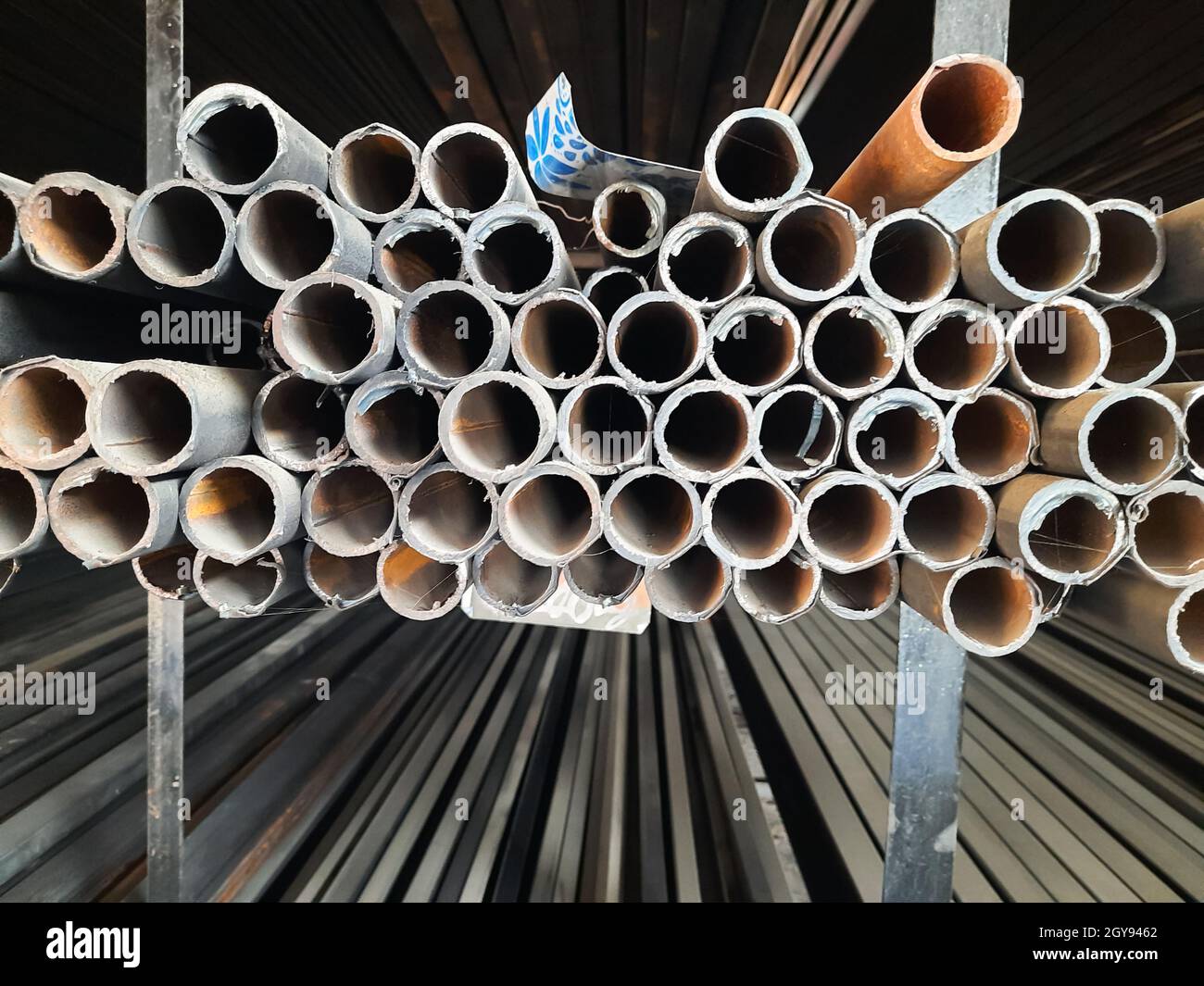 Rows of Steel Round Bar storage and stacking in the warehouse for ...