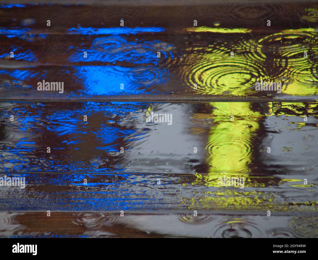Reflections of neon on a wet day in Brighton Stock Photo - Alamy