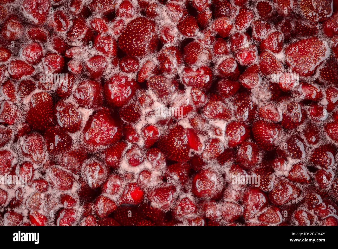 Strawberry jam, top view. Homemade Strawberry jam in making progress ...