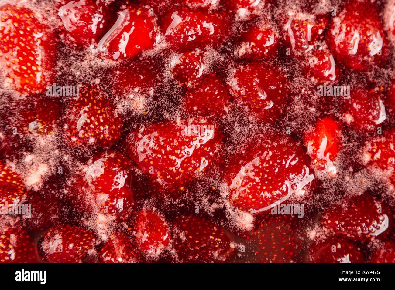 CLOSE UP: Strawberry jam. Homemade Strawberry jam in making progress ...