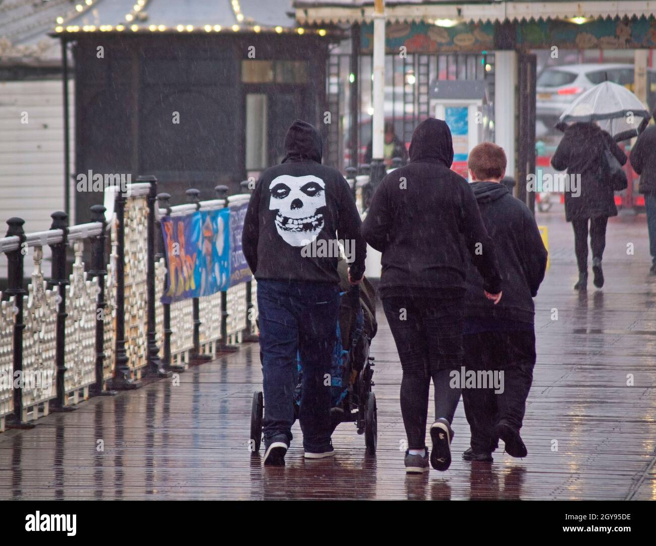 A wet day on the pier at Brighton Stock Photo - Alamy