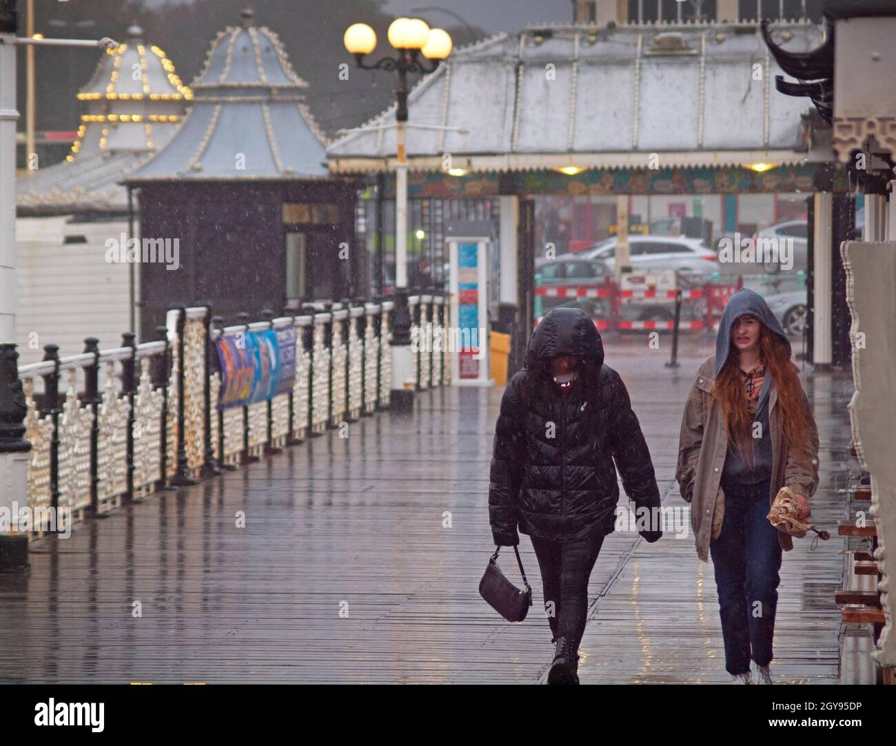 A wet day on the pier at Brighton Stock Photo - Alamy