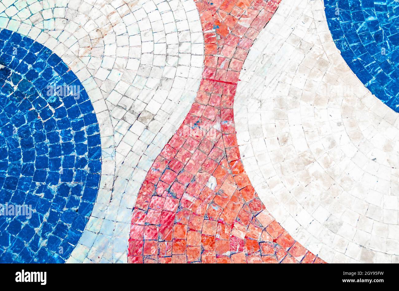 Colorful cobblestone pavement in Alicante, Spain, textured background ...