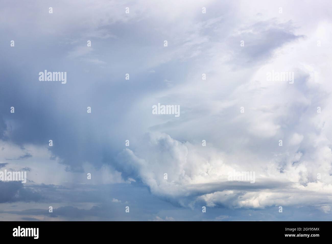 picturesque gray rainy clouds with whirls on June day Stock Photo - Alamy