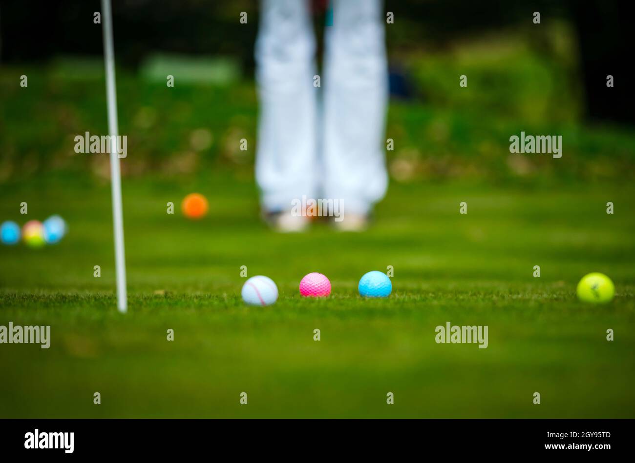 Bright colored golf balls hi-res stock photography and images - Alamy
