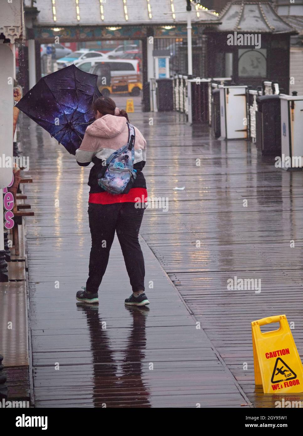 Umbrella weather brighton hi-res stock photography and images - Alamy