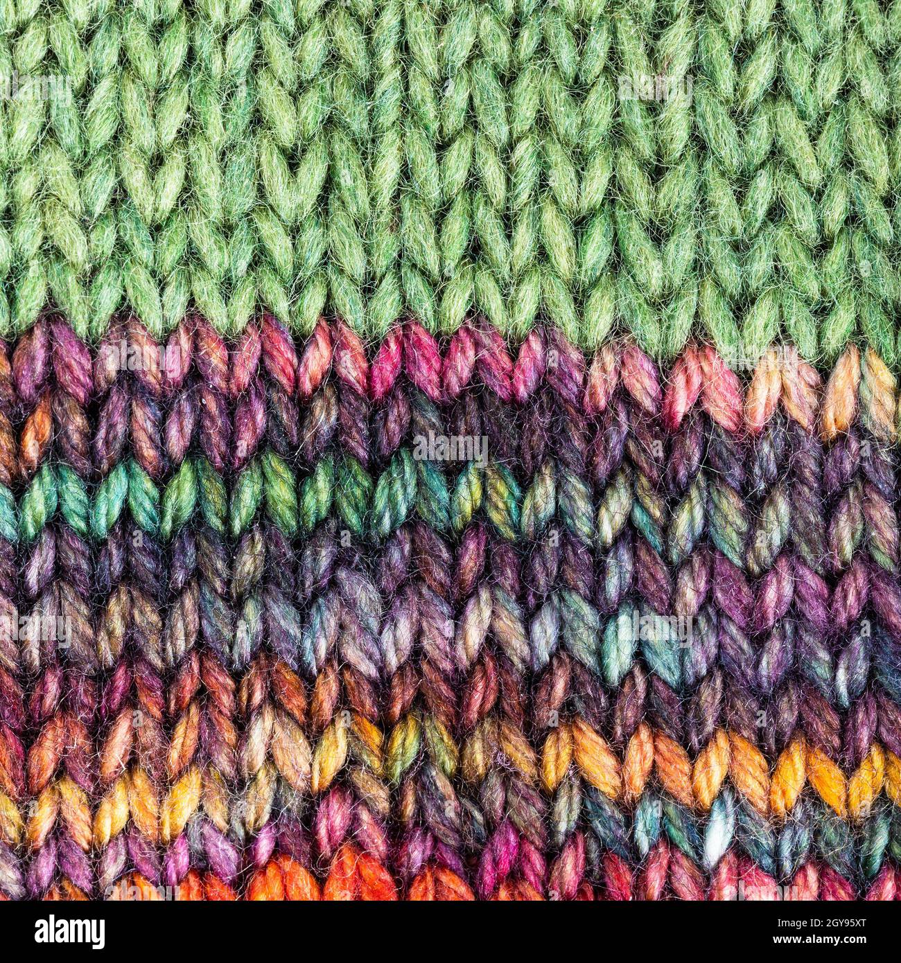 textile square background - texture of hand-knitted woolen cloth close ...