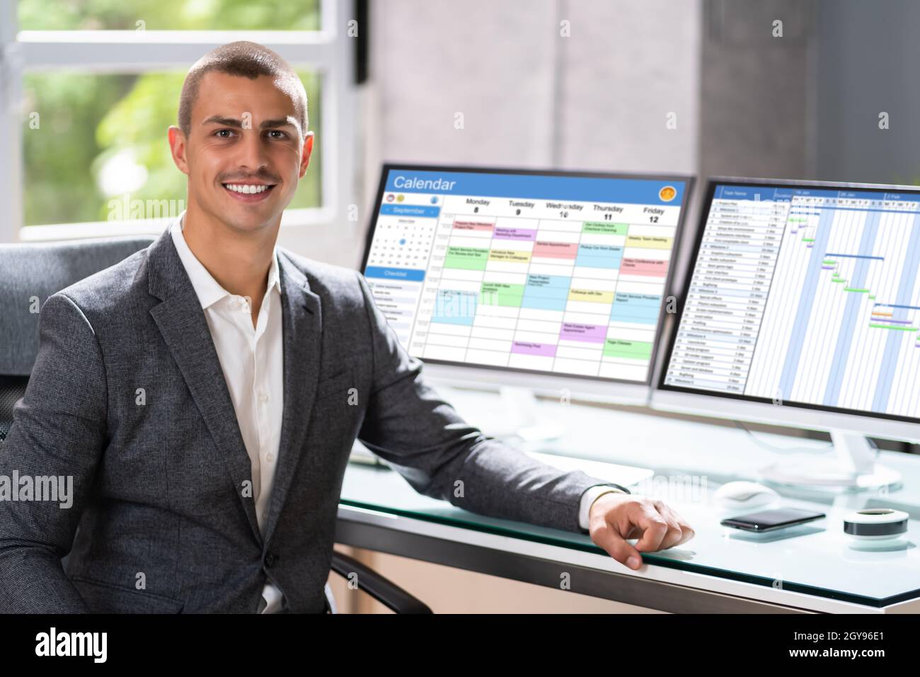 Happy Project Manager In Office Using Cloud Software On Computer Screen ...