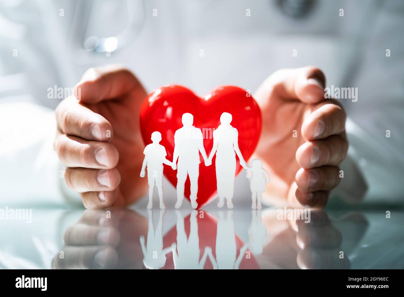 Health And Life Insurance. Heart Protected By Doctor Stock Photo - Alamy