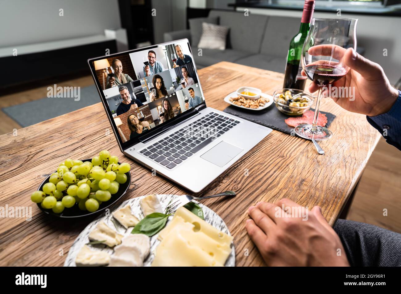 Digital Wine Tasting Virtual Dinner Event Using Laptop Stock Photo - Alamy
