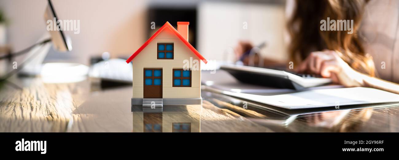 Calculating Asset Property Tax. Real Estate House Stock Photo - Alamy