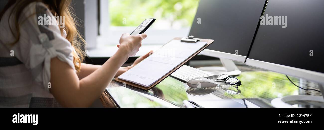 Invoice Document OCR. Taking Photo With Mobile Phone Stock Photo - Alamy