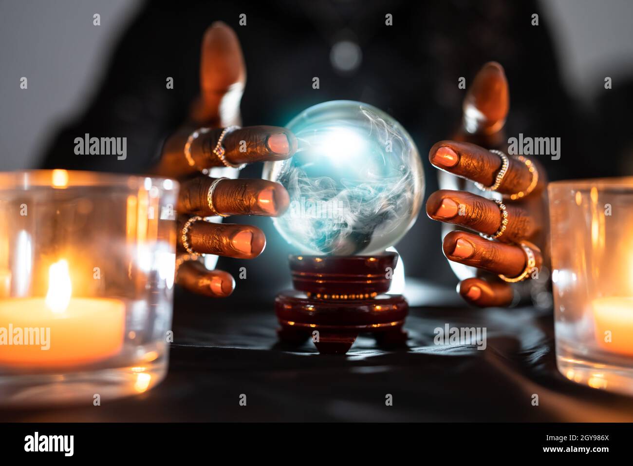 Fortune Teller Predicting Future Using Crystal Ball Stock Photo - Alamy