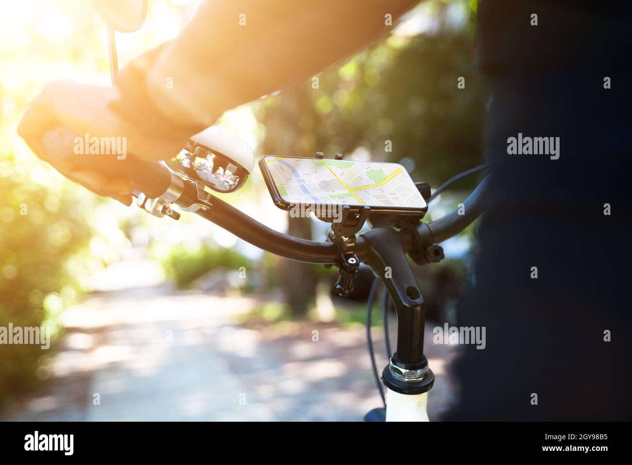 Bicycle GPS Navigator App With Map On Mobile Phone Stock Photo - Alamy