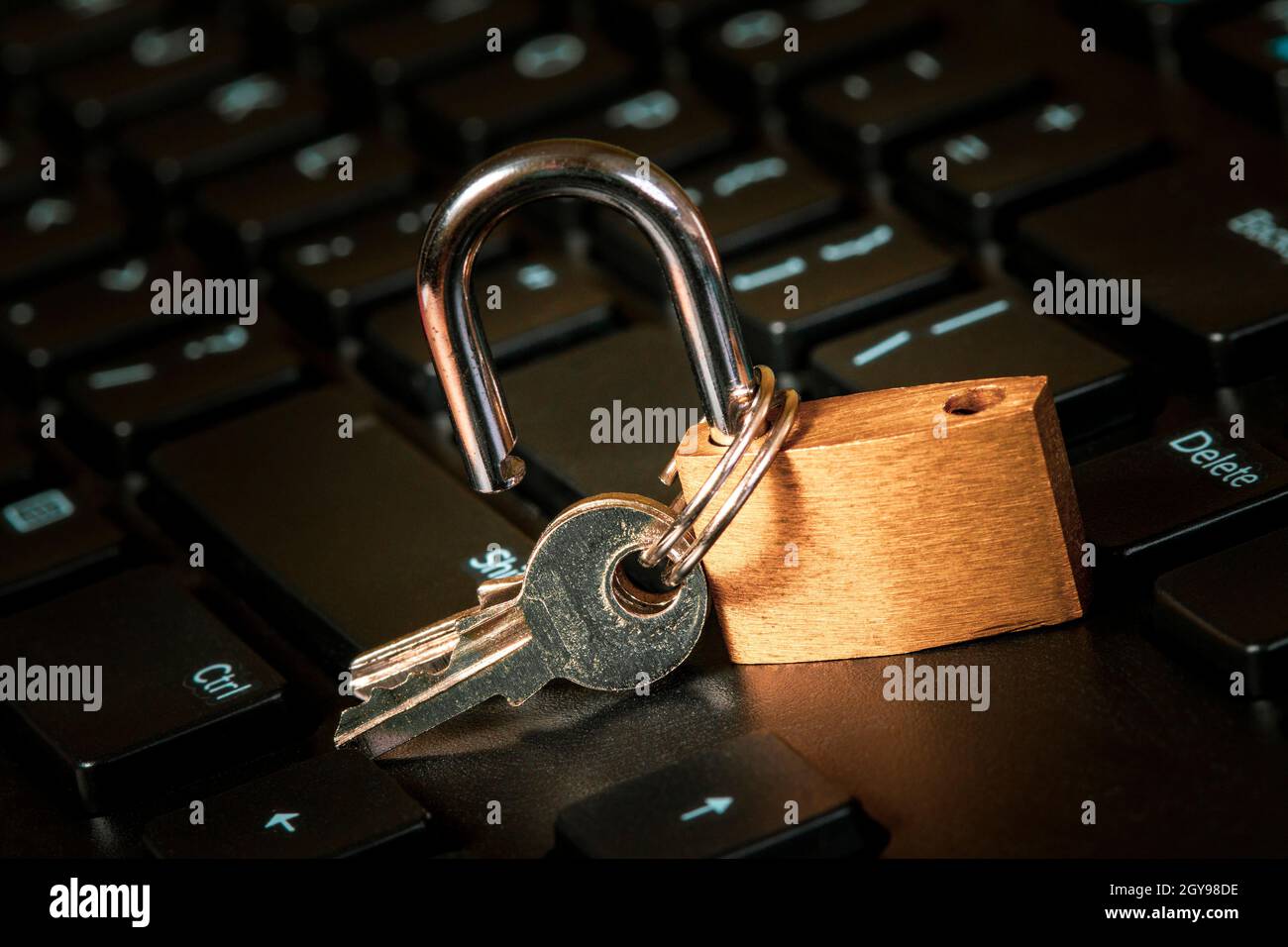 Open security lock on computer keyboard - computer security breach ...