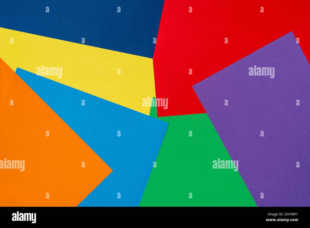 Multi-colored sheets of paper. Geometric background image. Creative ...