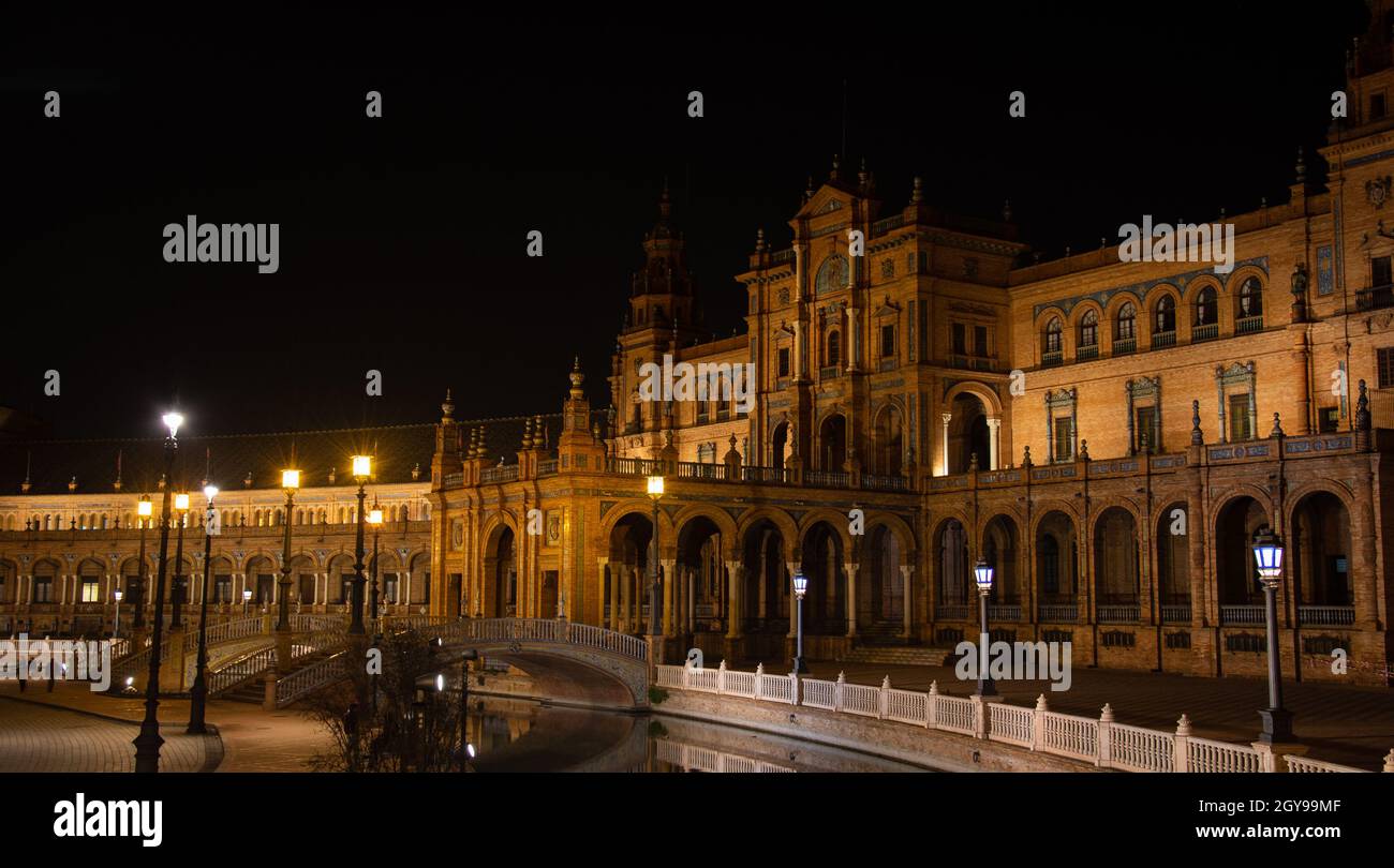 the romantic night in Plaza de Espana in Sevilla, Andalusia, Spain ...