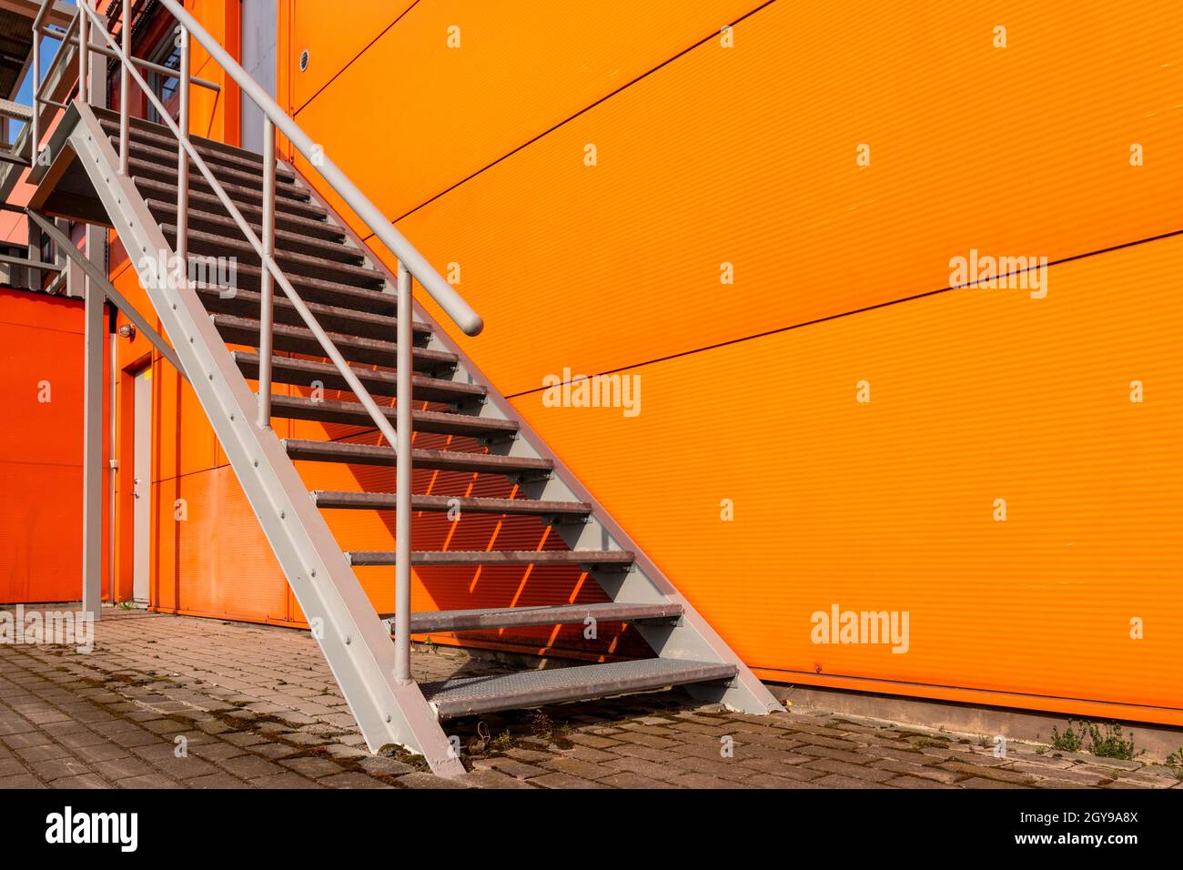 Iron staircase for up to maintenance work or fire escape. Metal stairs ...