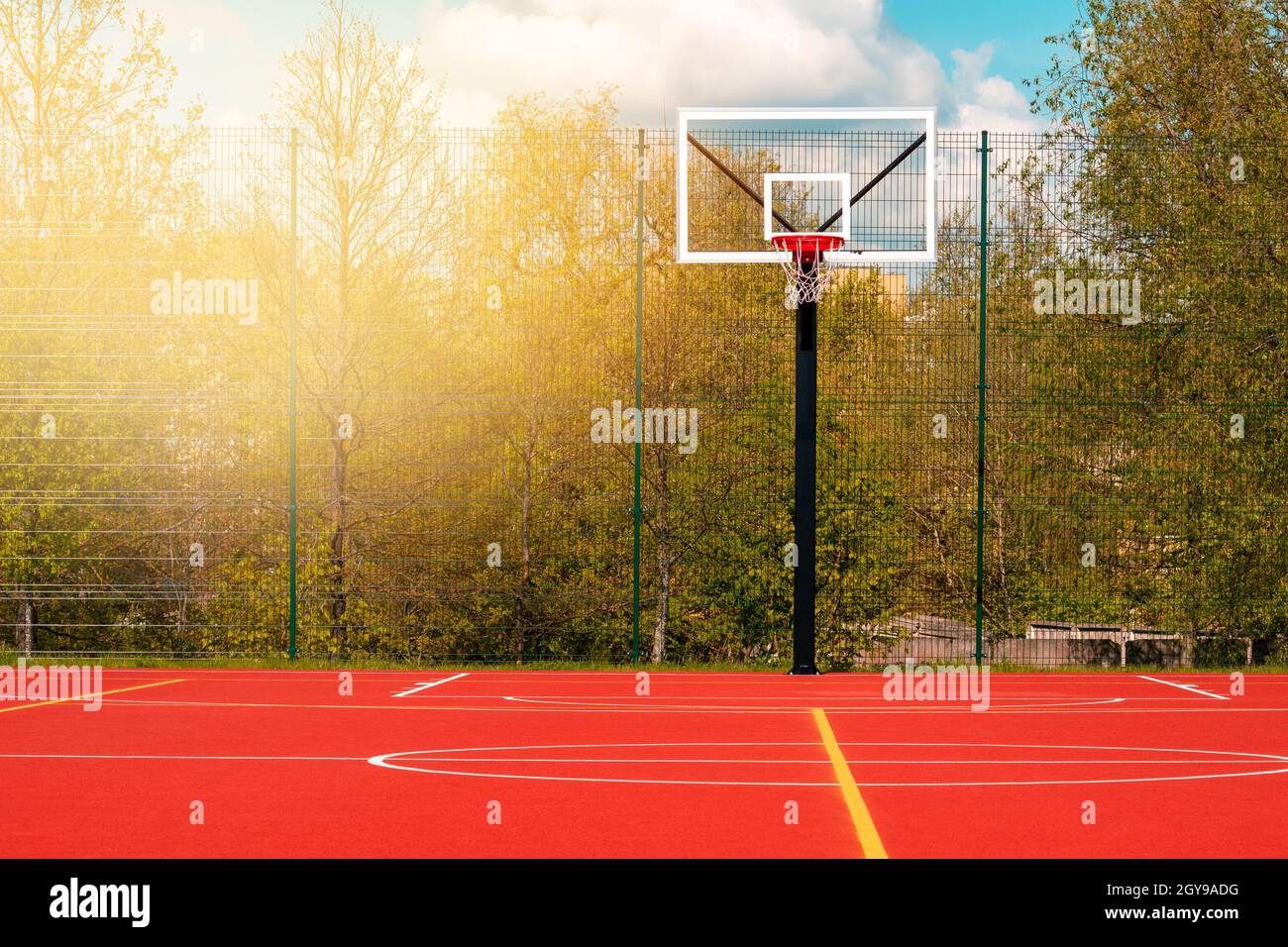 Basketball court in school stadium during spring season Stock Photo - Alamy