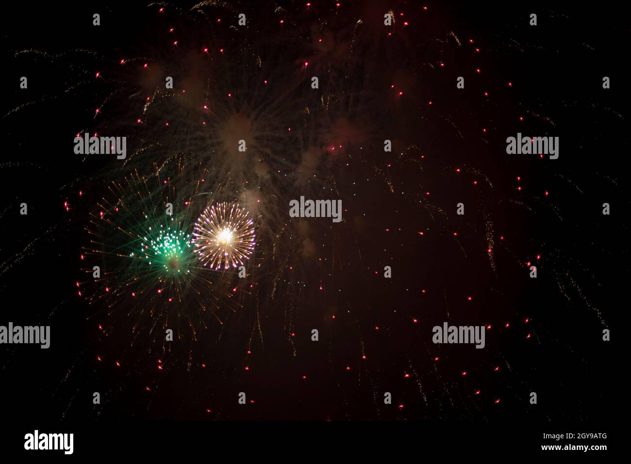 Salute in the sky. Explosion of fireworks in the night sky ...