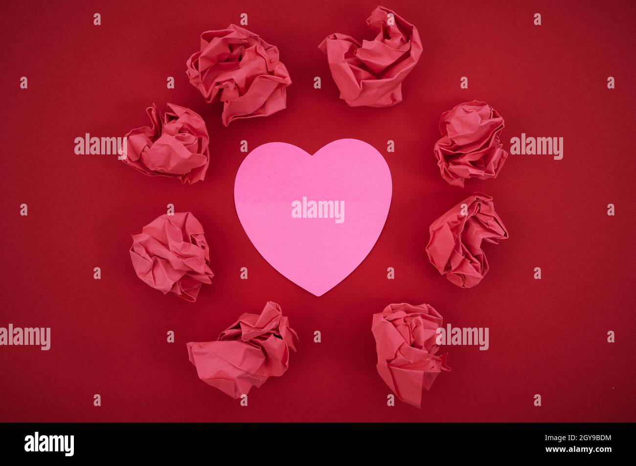 Colorful Crumpled Papers Circular Pattern Surrounding Heart Shaped Card ...