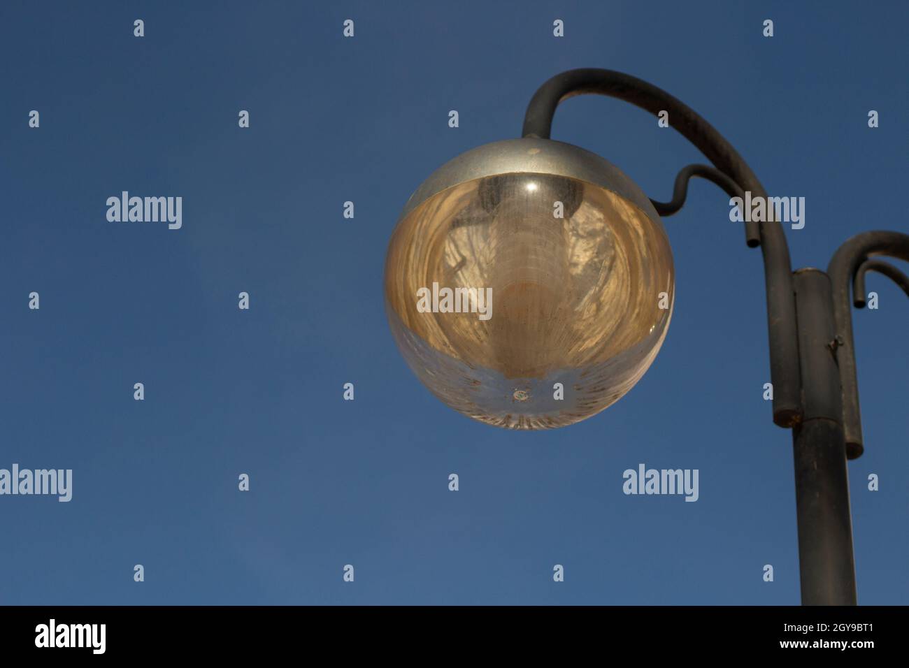 Street lighting during the day. Lighting in the park. Stand for light ...