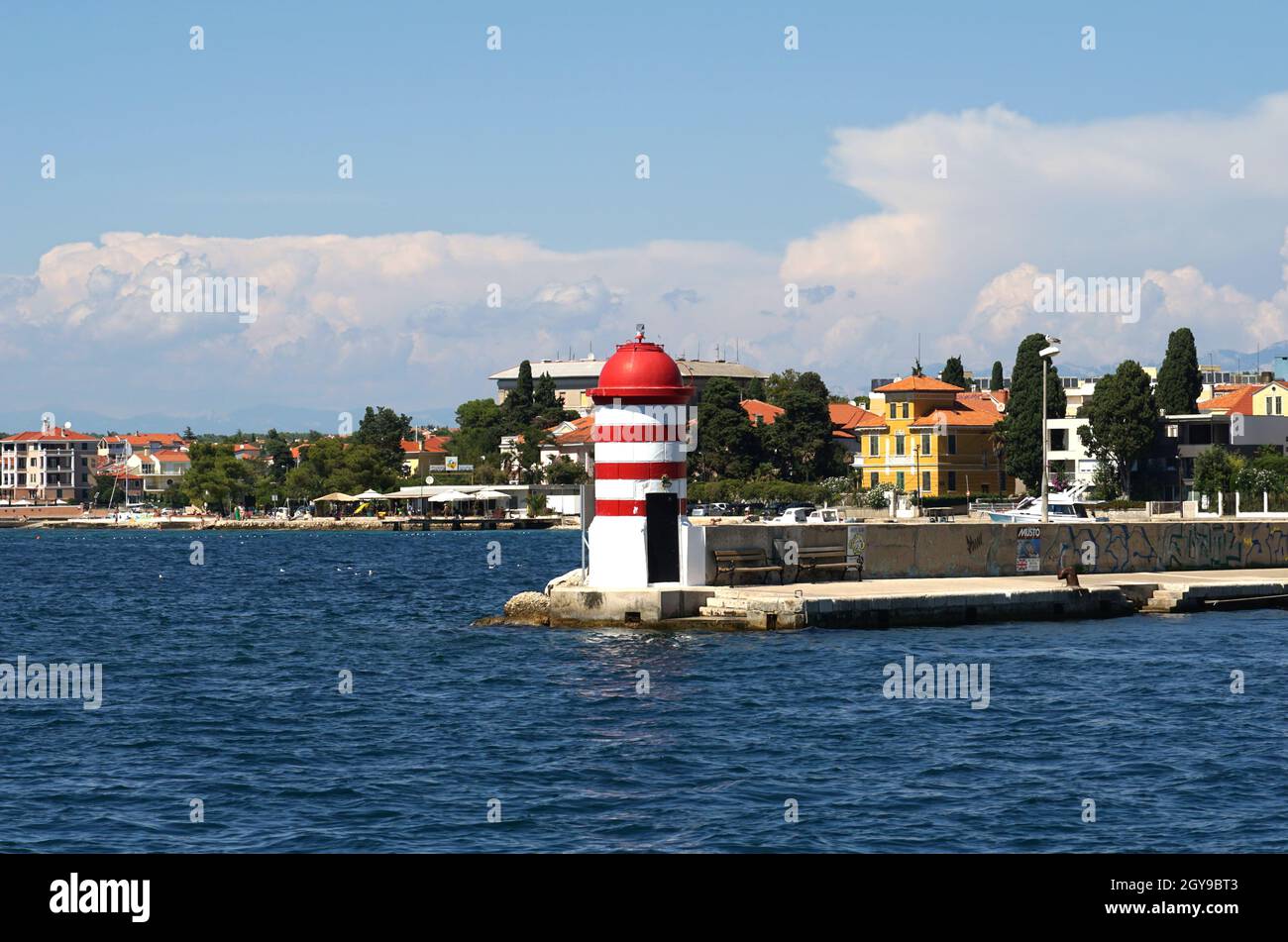 Zadar, Croatia, 16th August, 2020. Beautiful red and white lighthouse ...