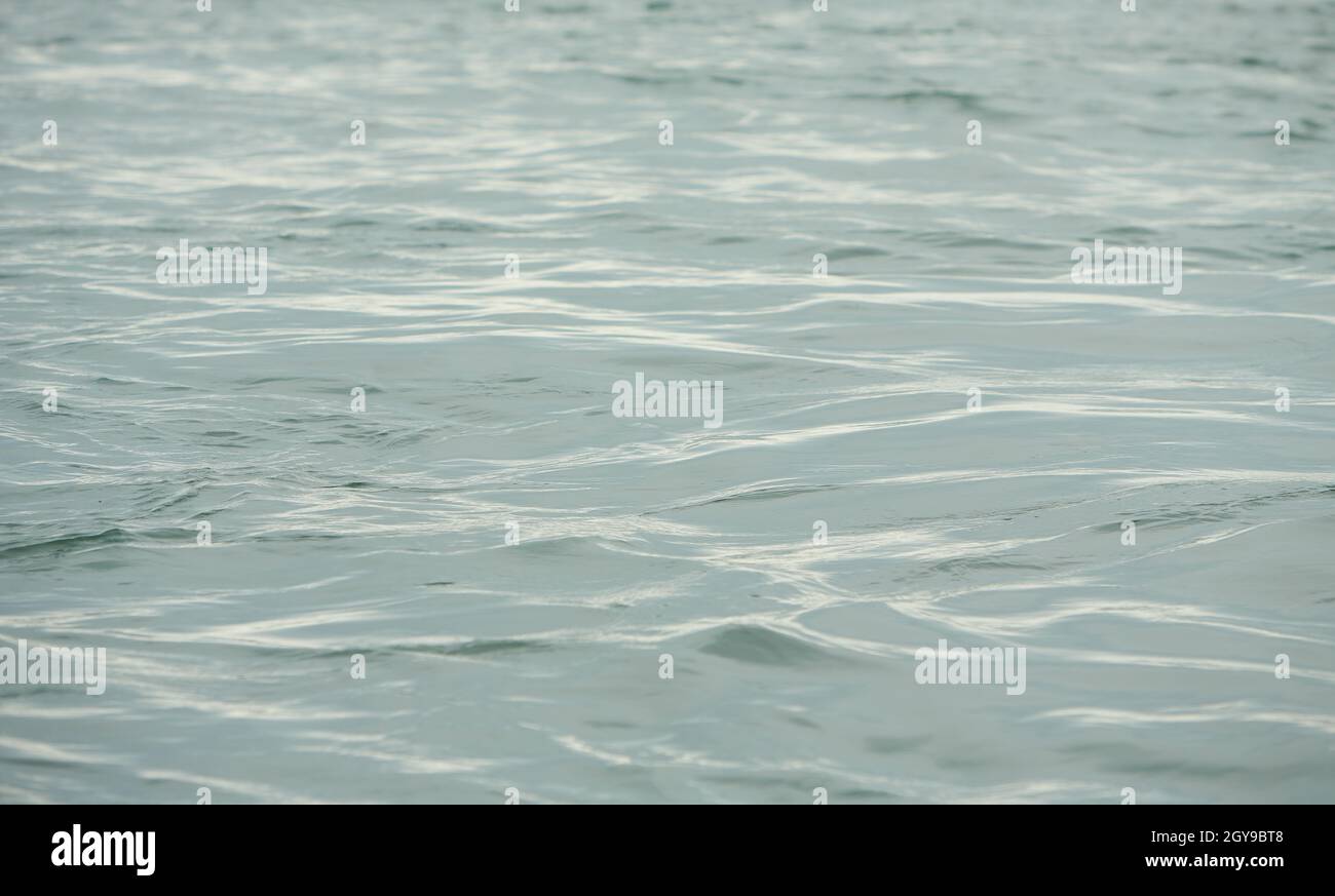 Texture of glitter water and soft waves. sparkling in water ...