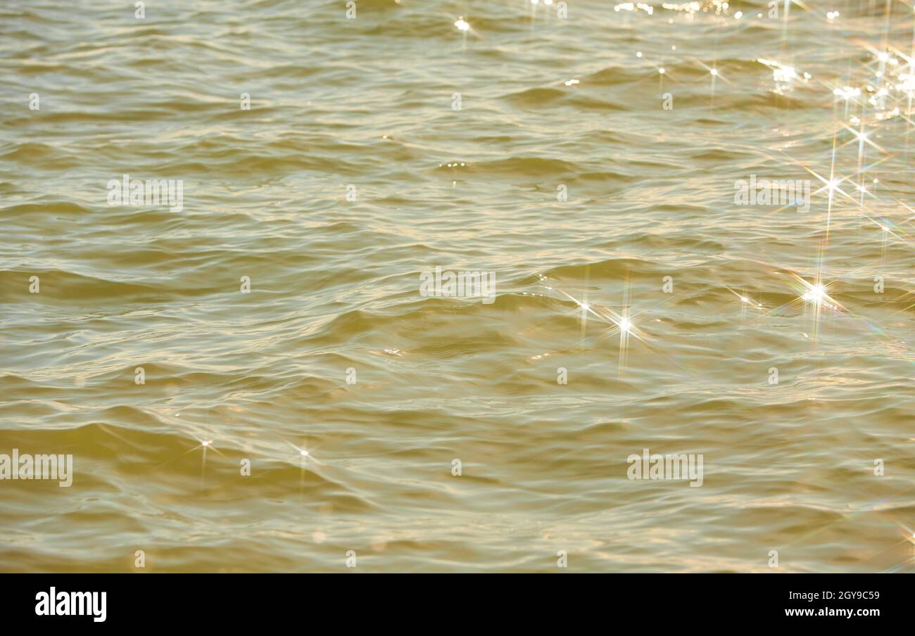Texture of glitter water and soft waves. sparkling in water ...