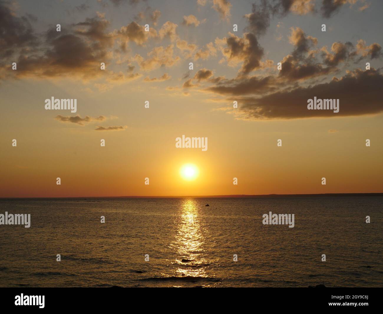 Sun sets sea water reflects hi-res stock photography and images - Alamy