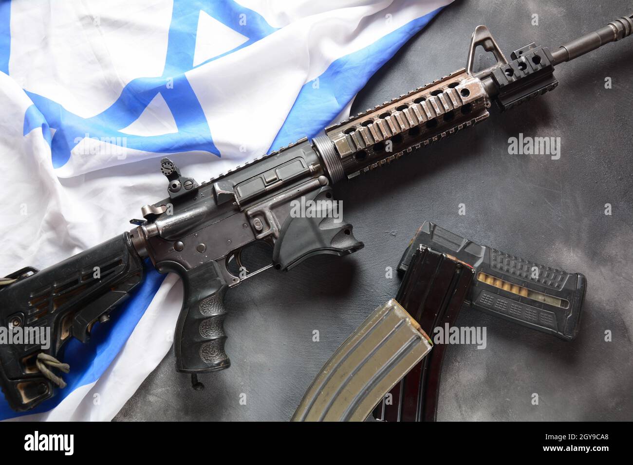 M4 carbine with Israeli flag on the background. Yom Ha'atzmaut ...