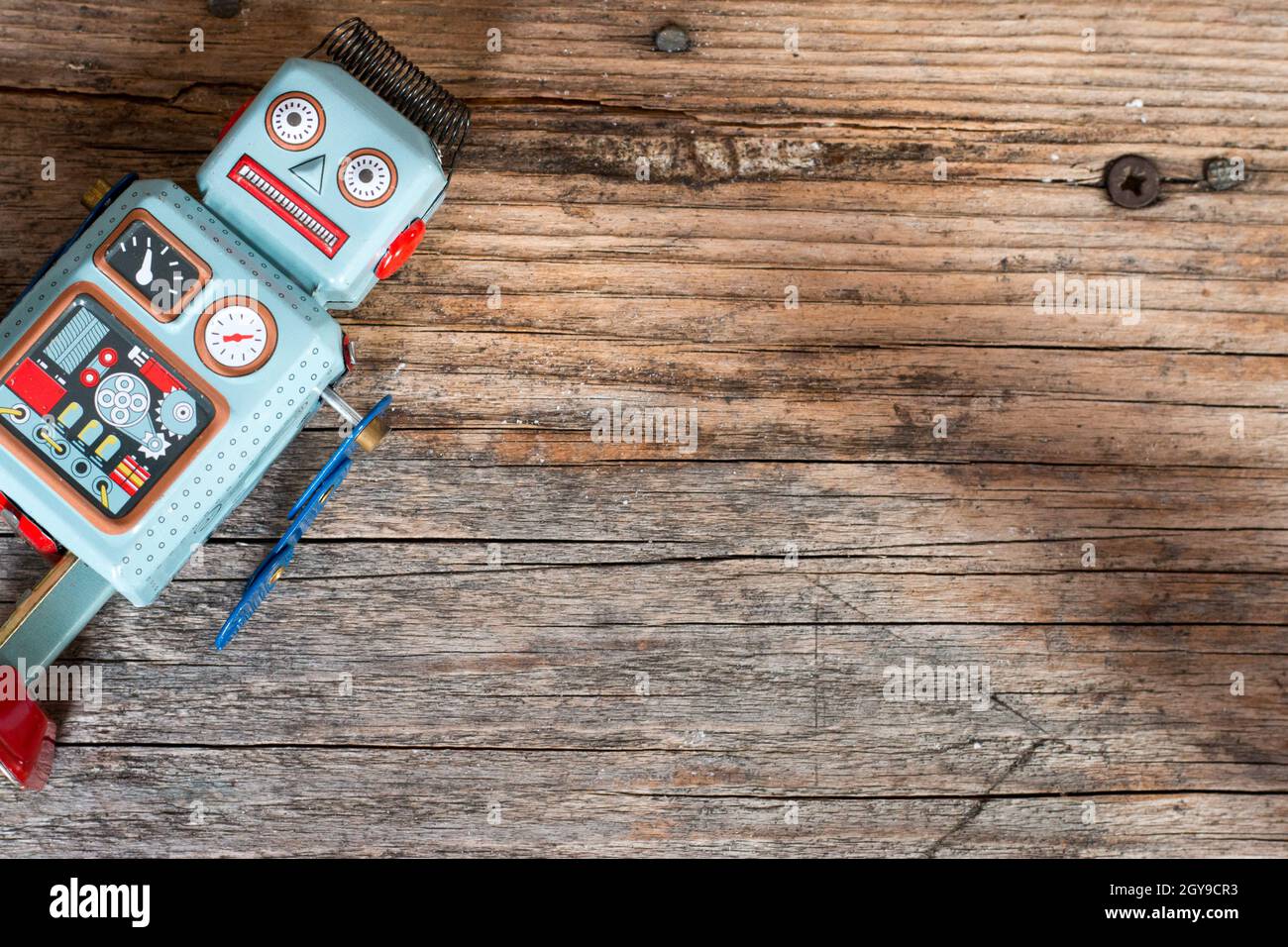 Robot toy, symbol for a chatbot or social bot and algorithms. Wood ...