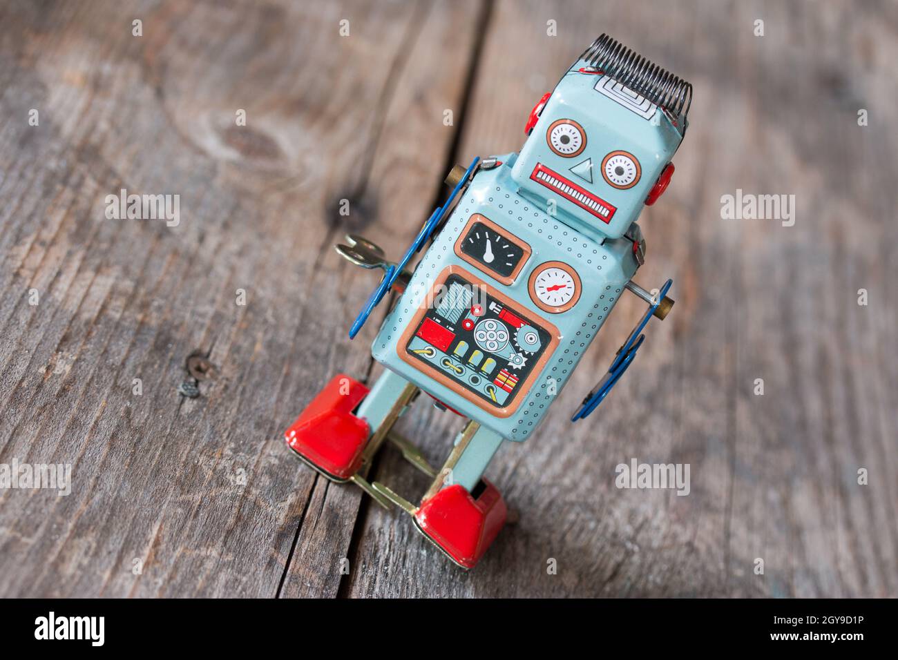 Robot toy, symbol for a chatbot or social bot and algorithms. Wood ...