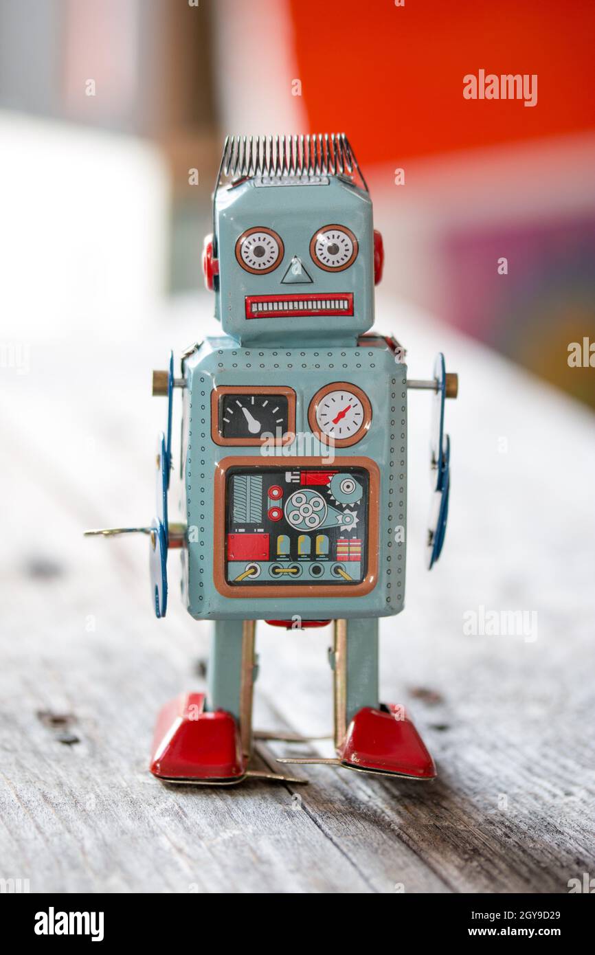 Robot toy, symbol for a chatbot or social bot and algorithms. Wood ...