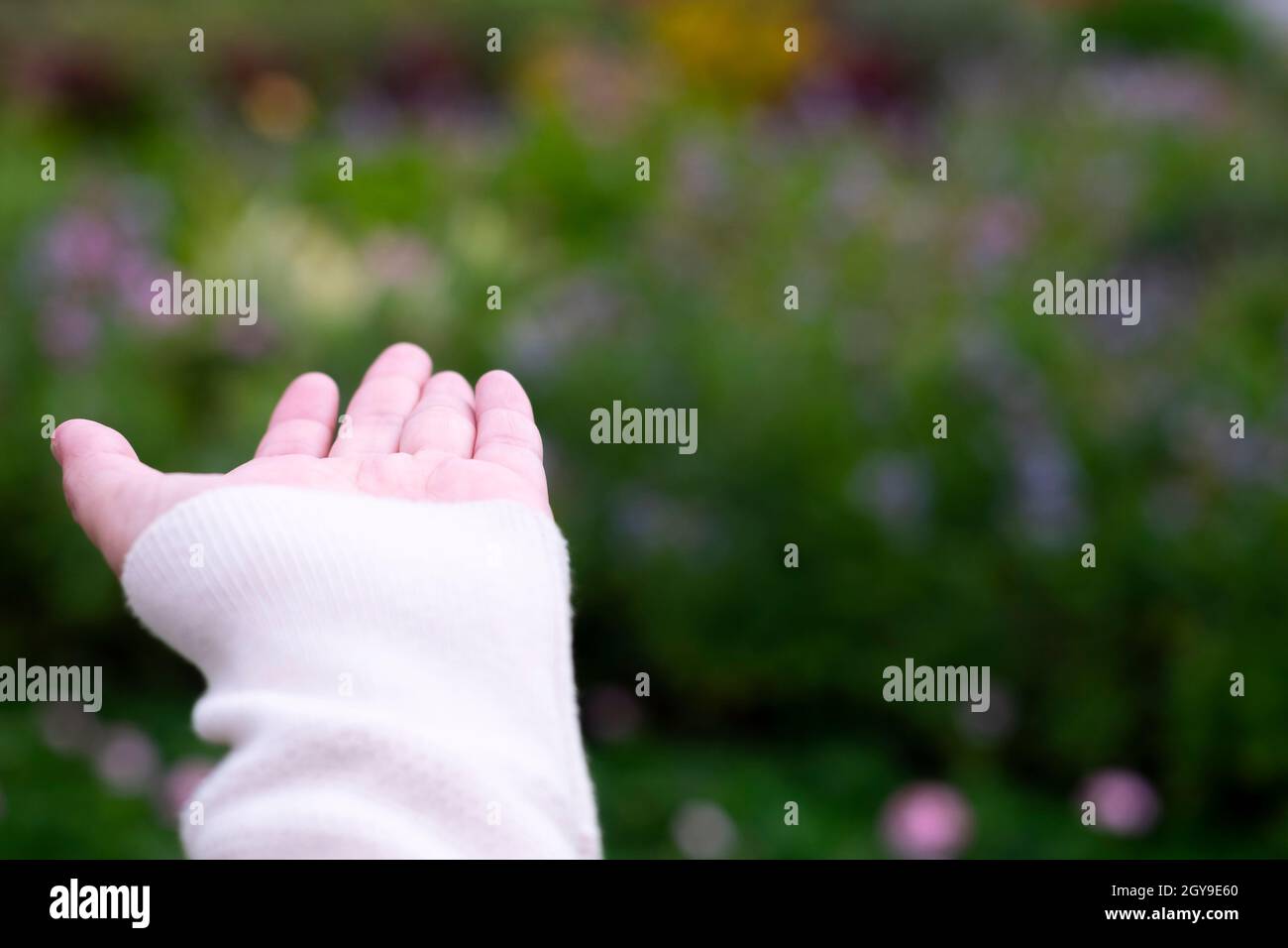 Movement with an empty hand or finger. Empty hand extending the arm to ...