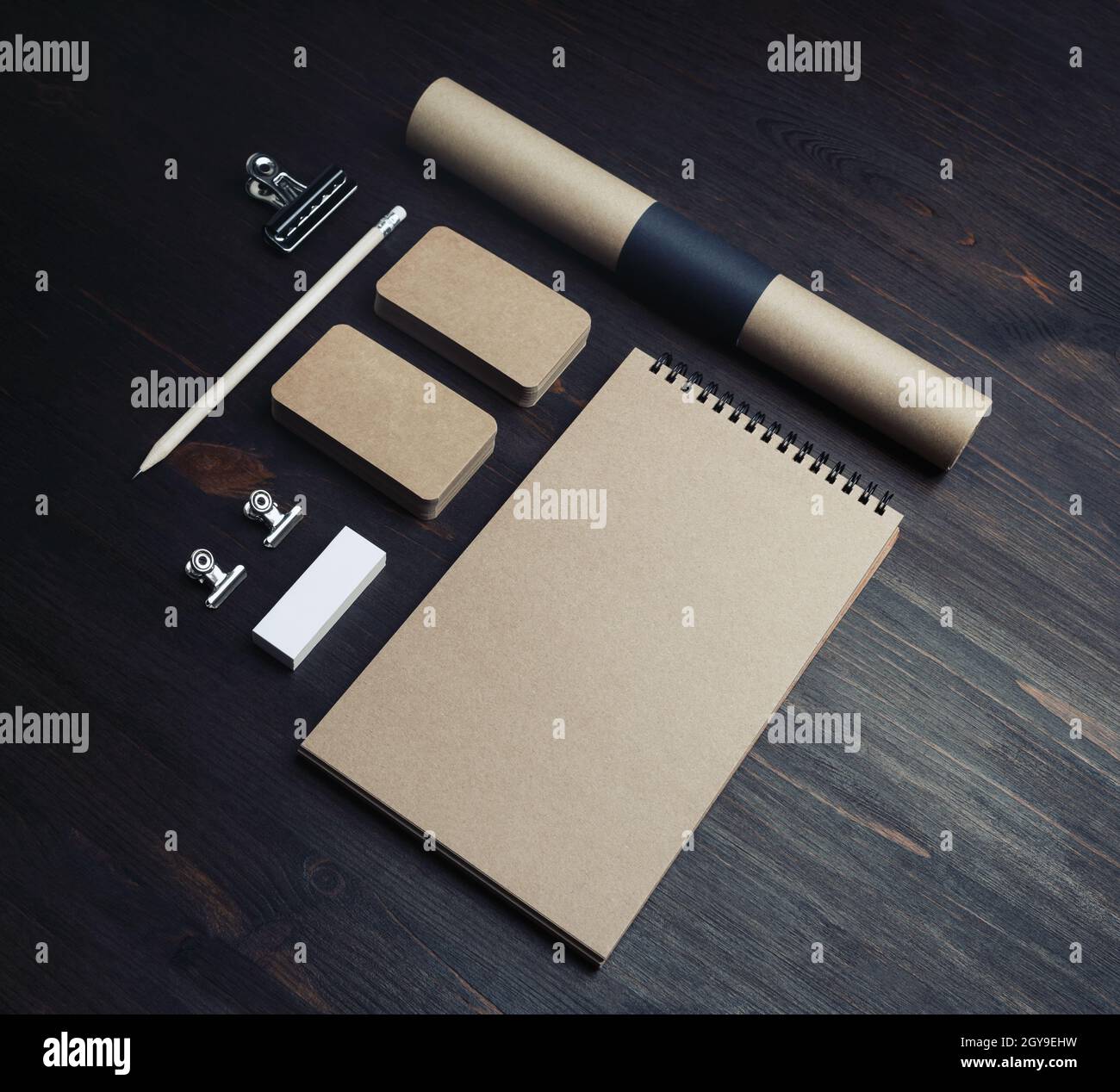 Blank vintage stationery set on wood table background. Responsive ...