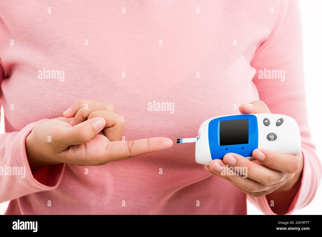 Closeup hand woman measuring glucose test level checking on finger by ...