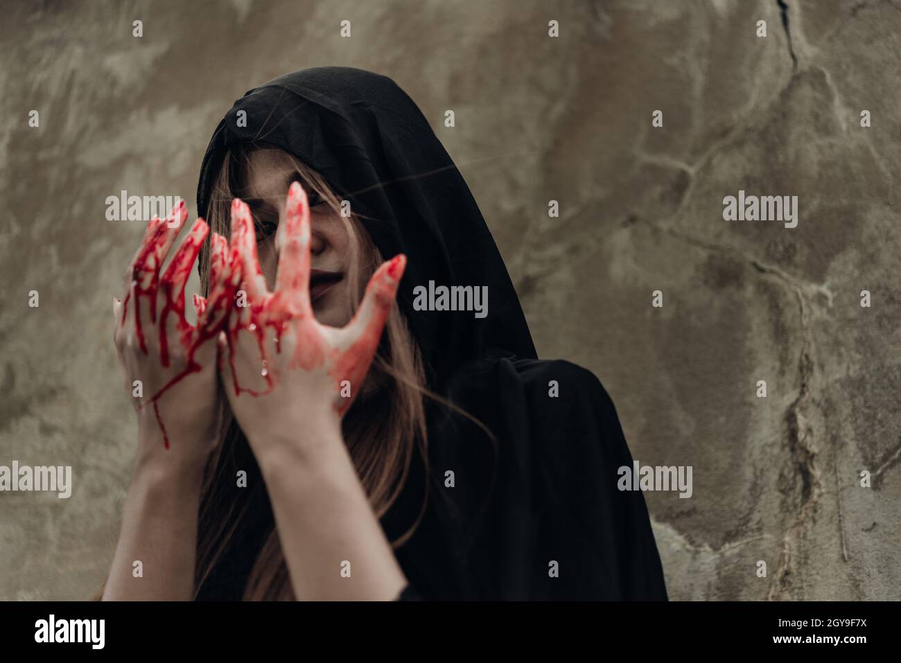 Portrait monster woman ghost and hand have red blood, halloween concept ...