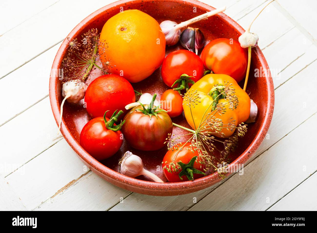 Salted fresh tomatoes.Cooking process,canned tomatoes.Pickled ...