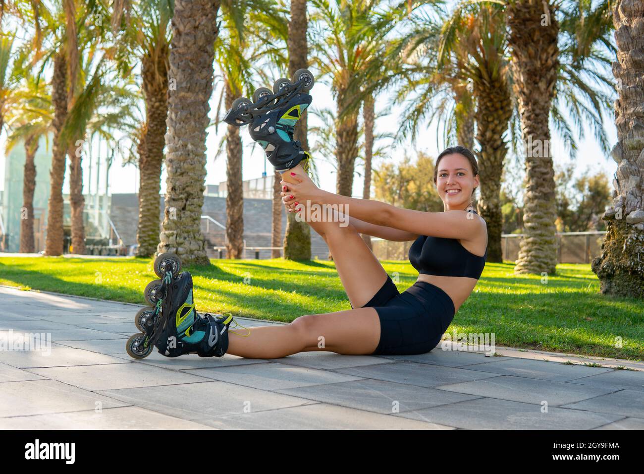 Young sportswoman raising leg up hi-res stock photography and images ...