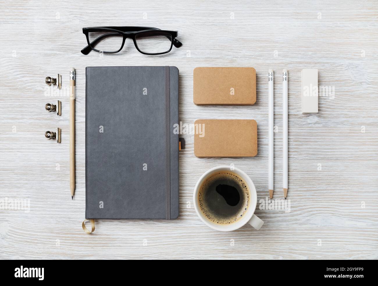 Photo of blank stationery set on light wooden background. Corporate ...